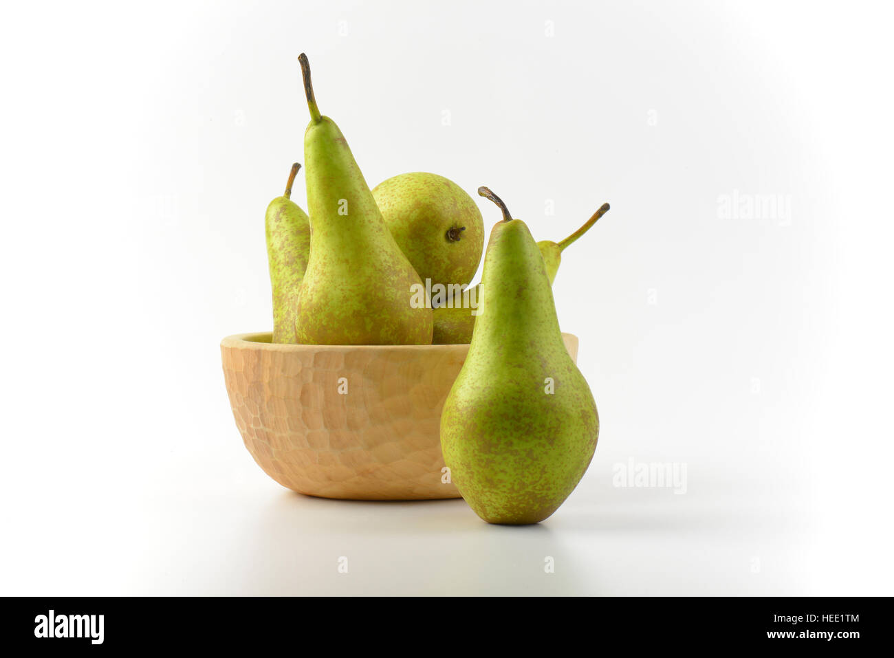 fresh green pears in wooden bowl Stock Photo - Alamy