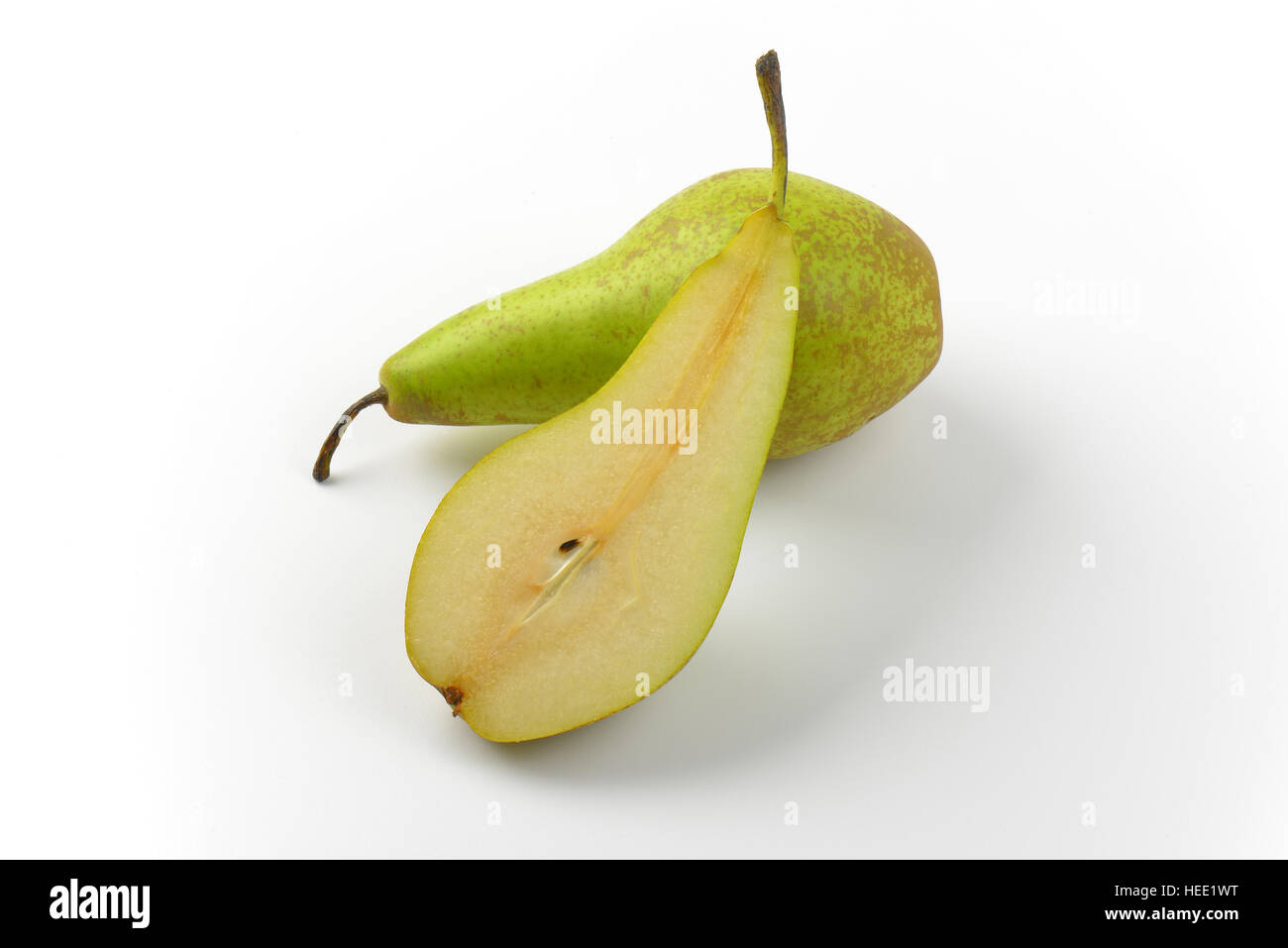 one whole pear and a half (cross section Stock Photo - Alamy