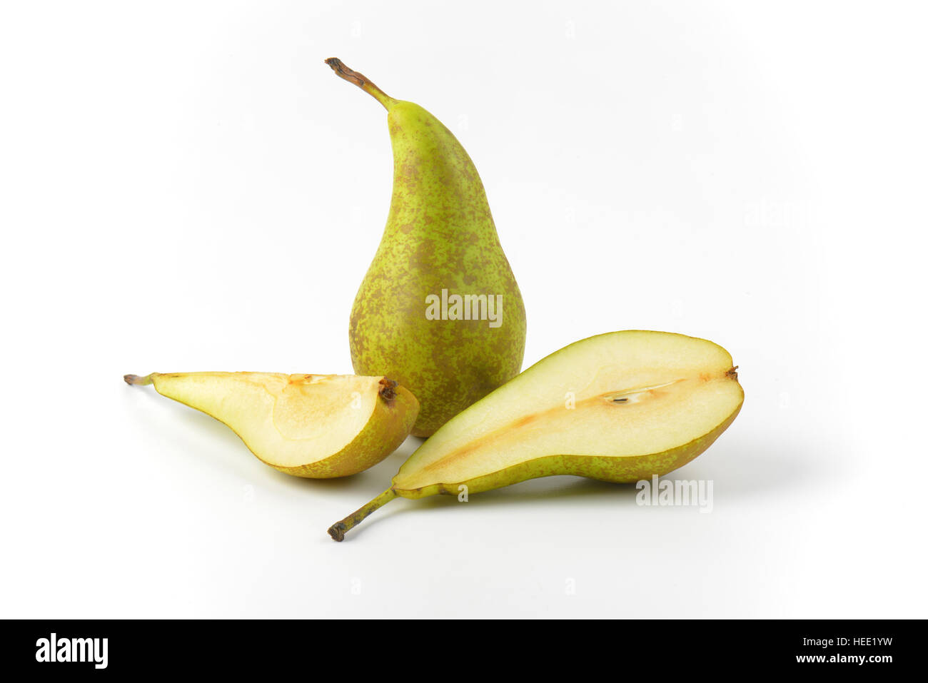 one whole pear, one half a pear and slice Stock Photo - Alamy