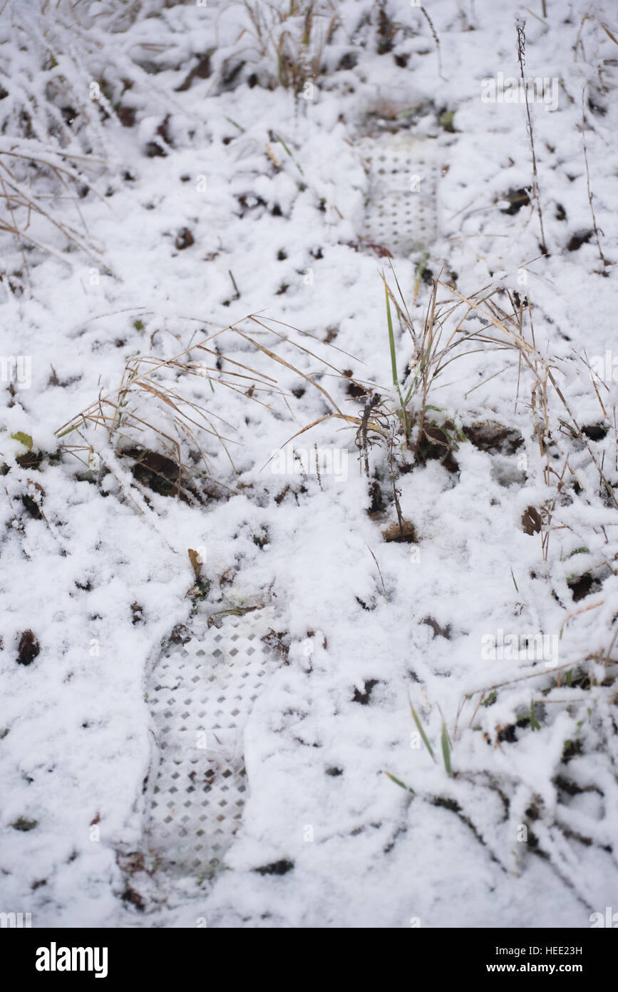 Girl in boots on snow hi-res stock photography and images - Alamy