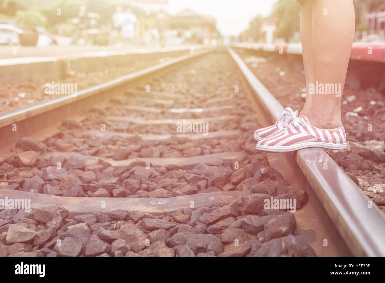 Close up legs of woman walking in railway Stock Photo - Alamy