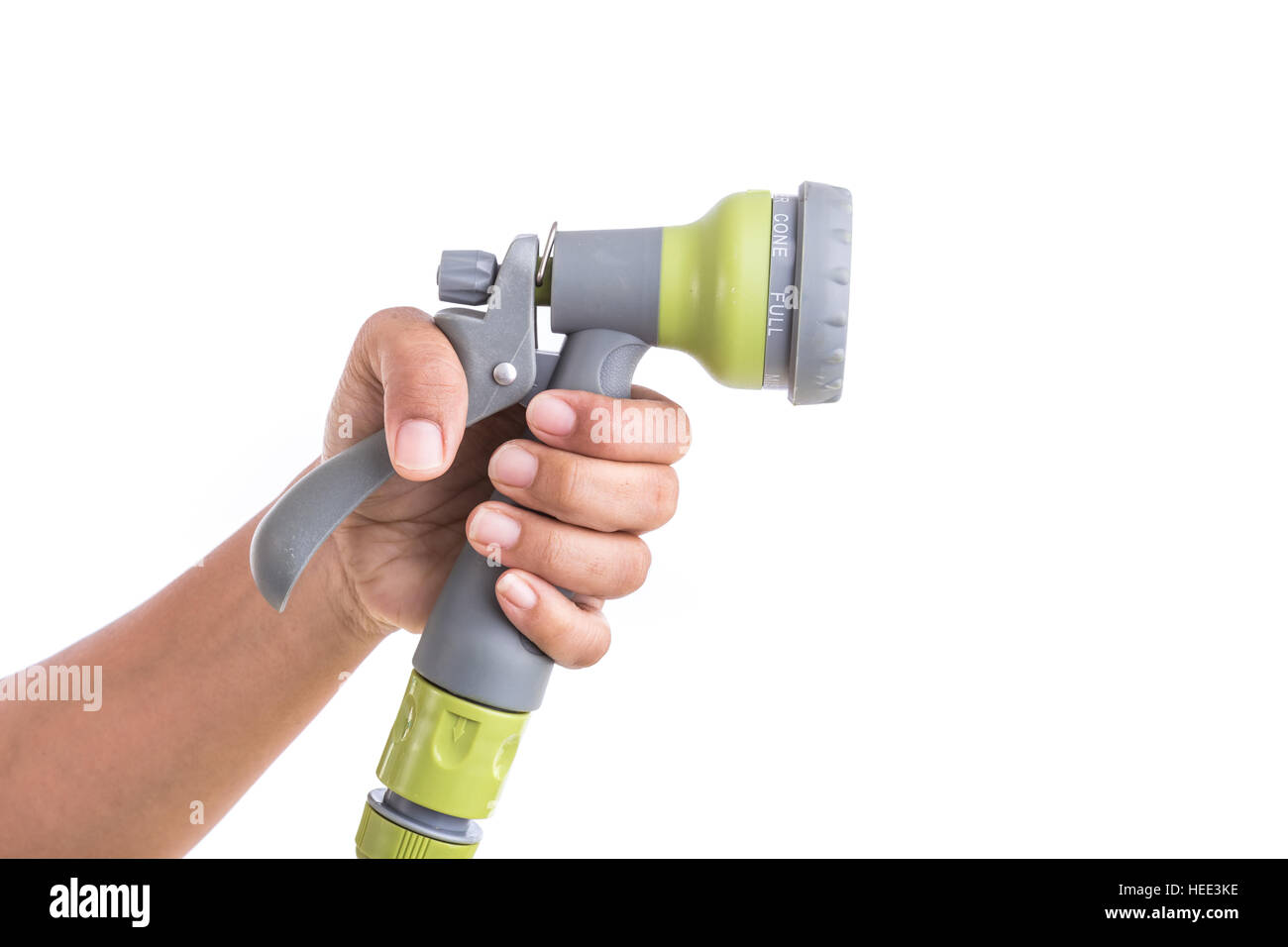 Close up hand holding spary gun isolated on white background Stock ...