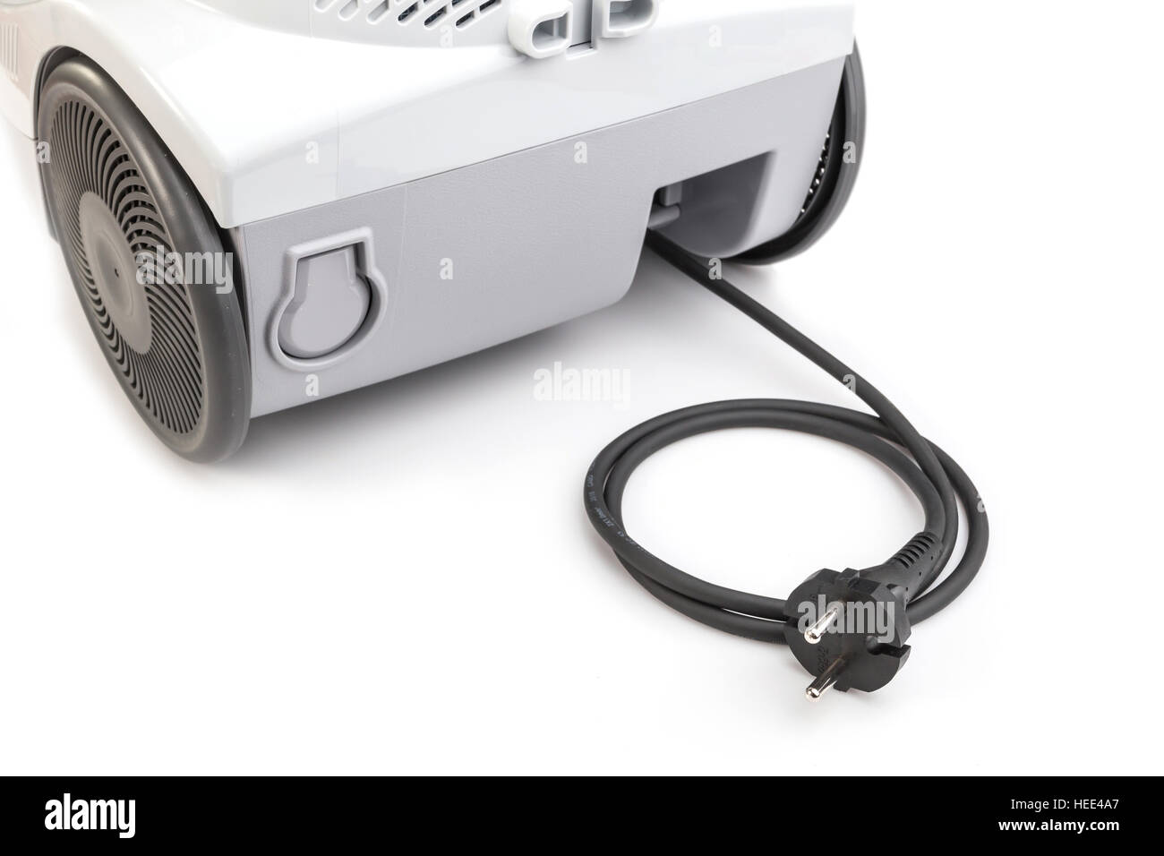 Black power cable on back side of vacuum cleaner isolated on white ...