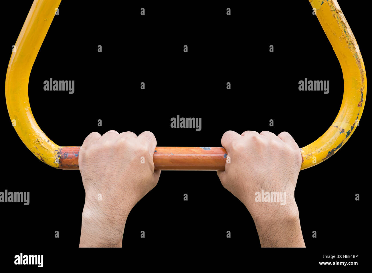 Close up hand hanging on steel bar for trapeze. Outdoor exercise ...