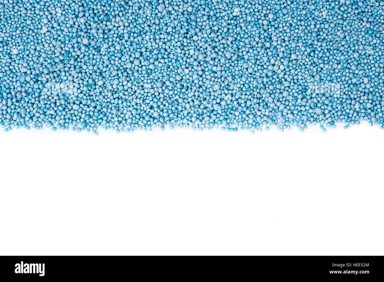 Top view of pattern blue urea fertilizer isolated on white background ...