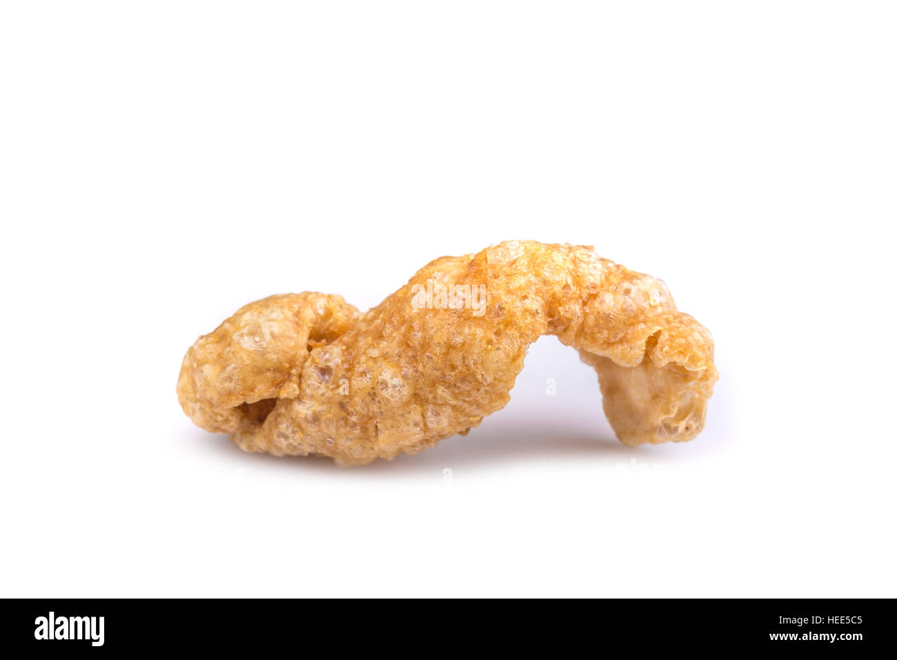 Close up pork snack or pork crackling isolated on white background ...