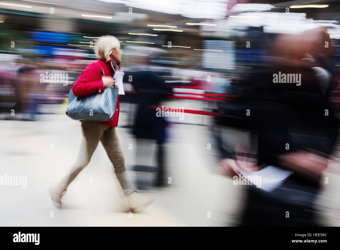 picture with creative motion blur effect of traveling people at the ...