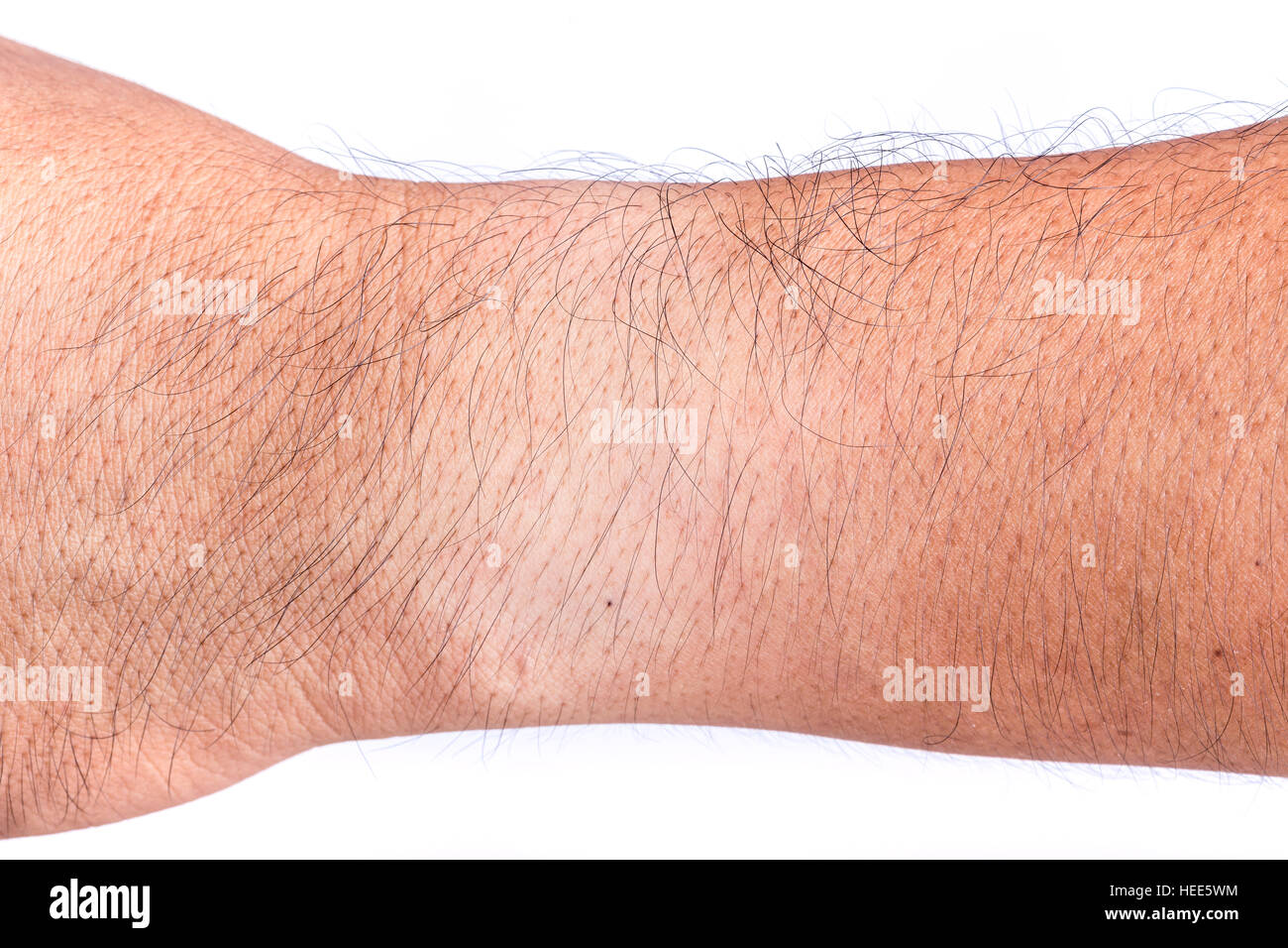 Different skin color tone on wrist under the watch on white background ...