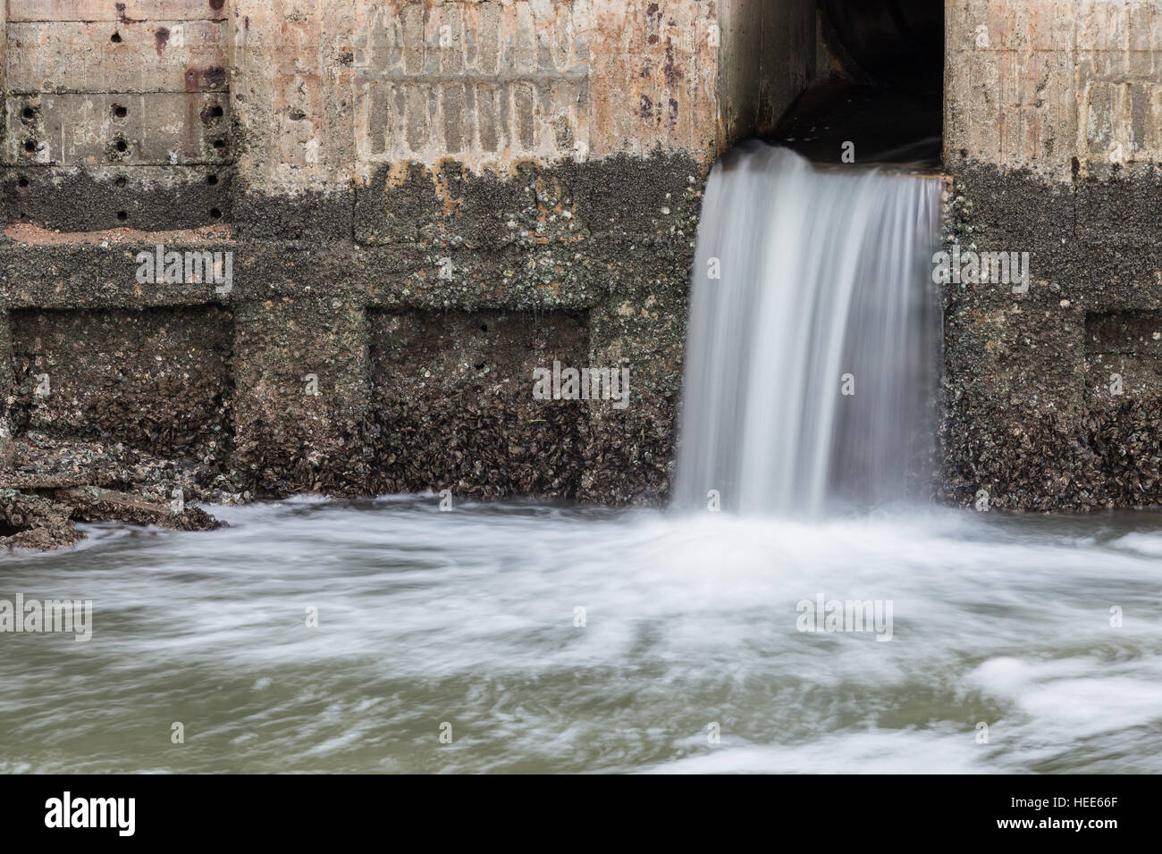 Industrial waste flowing into river hi-res stock photography and images ...
