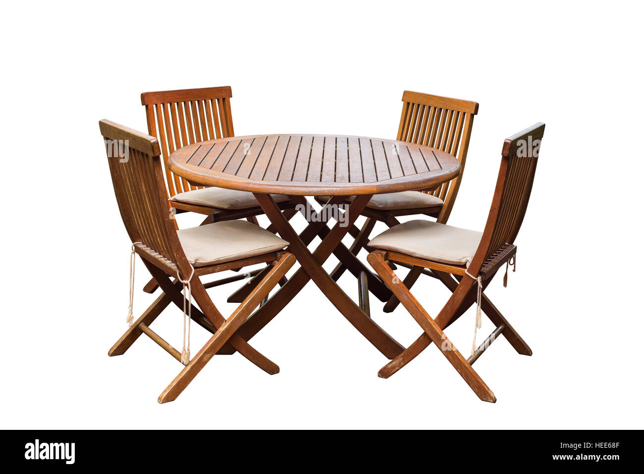 Set of teak wood table and chairs isolated on white background. Saved ...