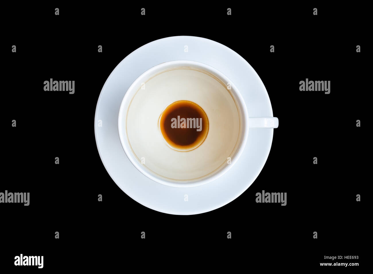 Top view empty coffee cup after drinking isoalted on black background ...