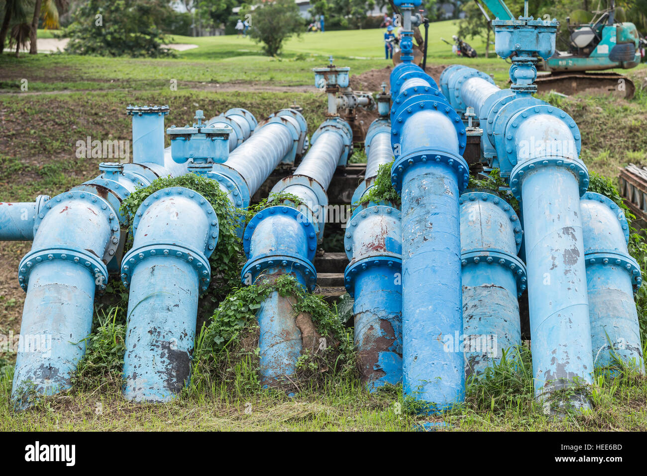 Old big blue color main pipe for water supply Stock Photo - Alamy