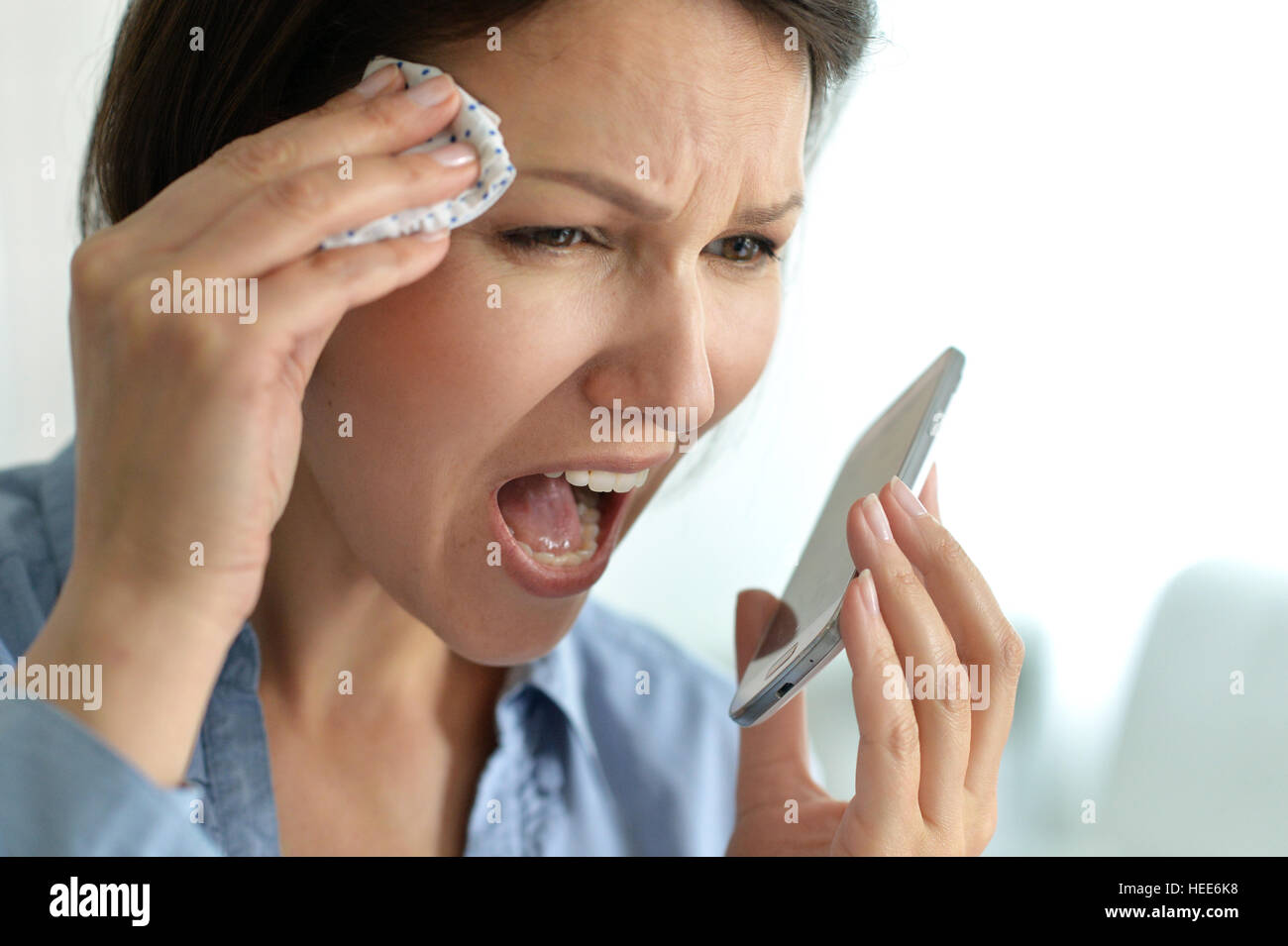 young woman crying in phone Stock Photo - Alamy