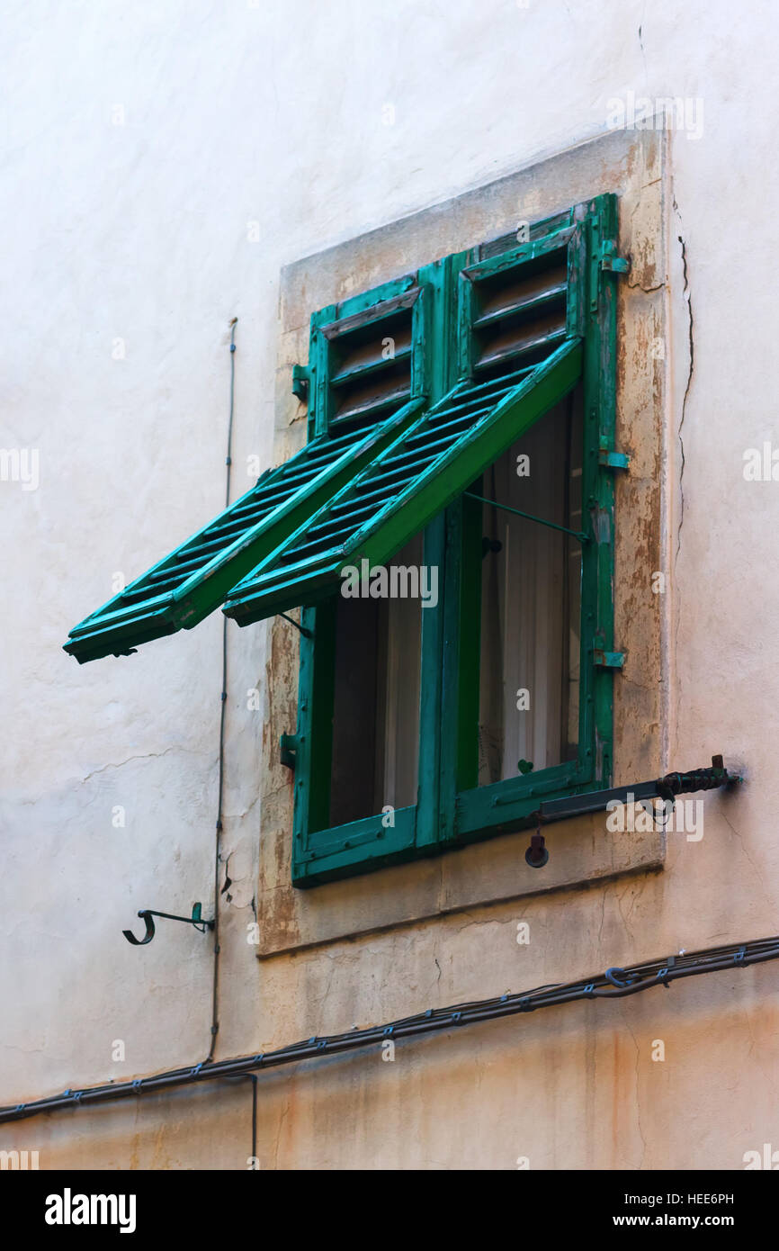 old shuttered window at a house in Florence, Italy Stock Photo - Alamy