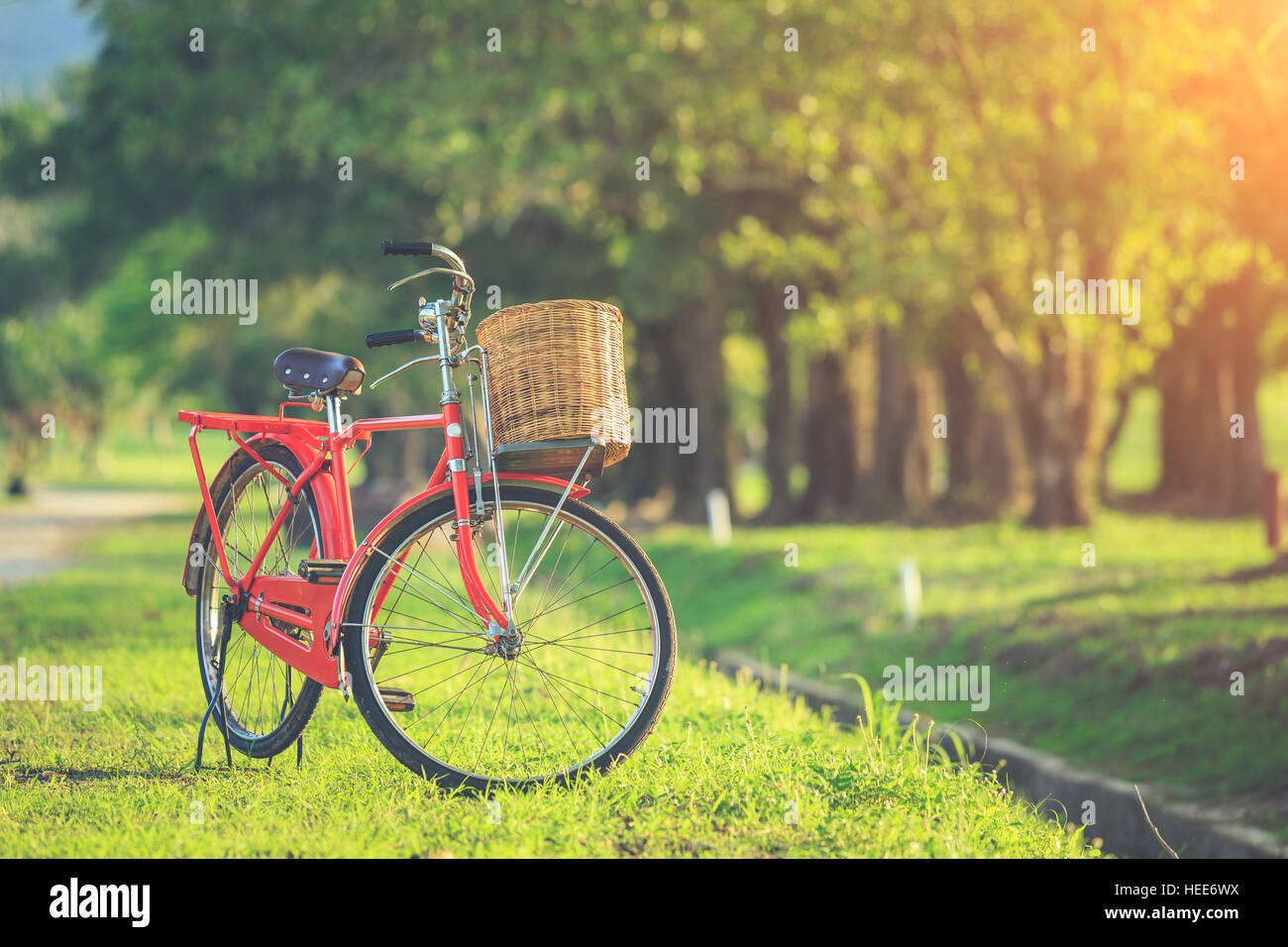 Red Japan style classic bicycle at the park, Vintage filter effect ...