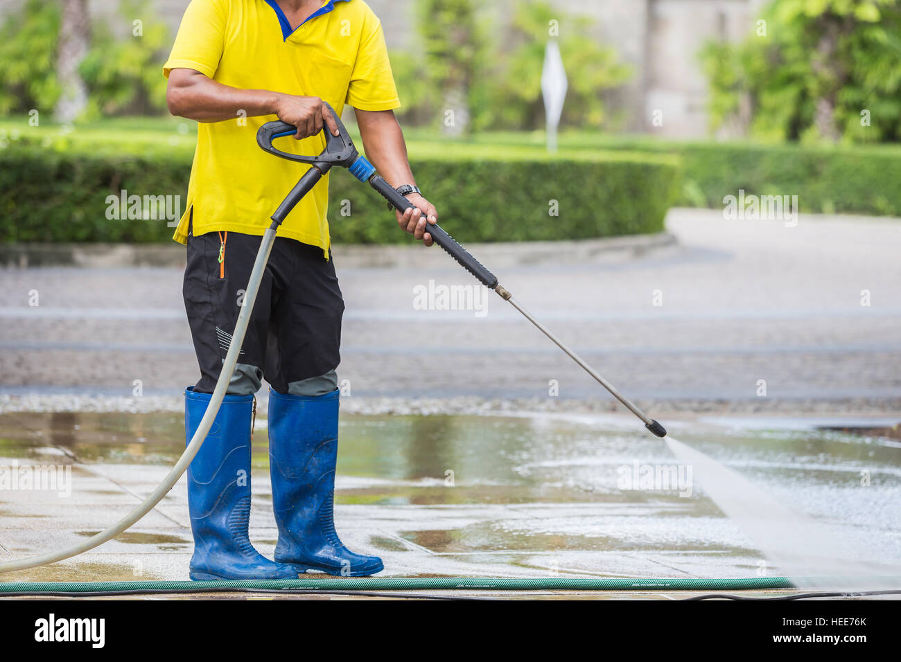 Outdoor floor cleaning with high pressure water jet Stock Photo - Alamy