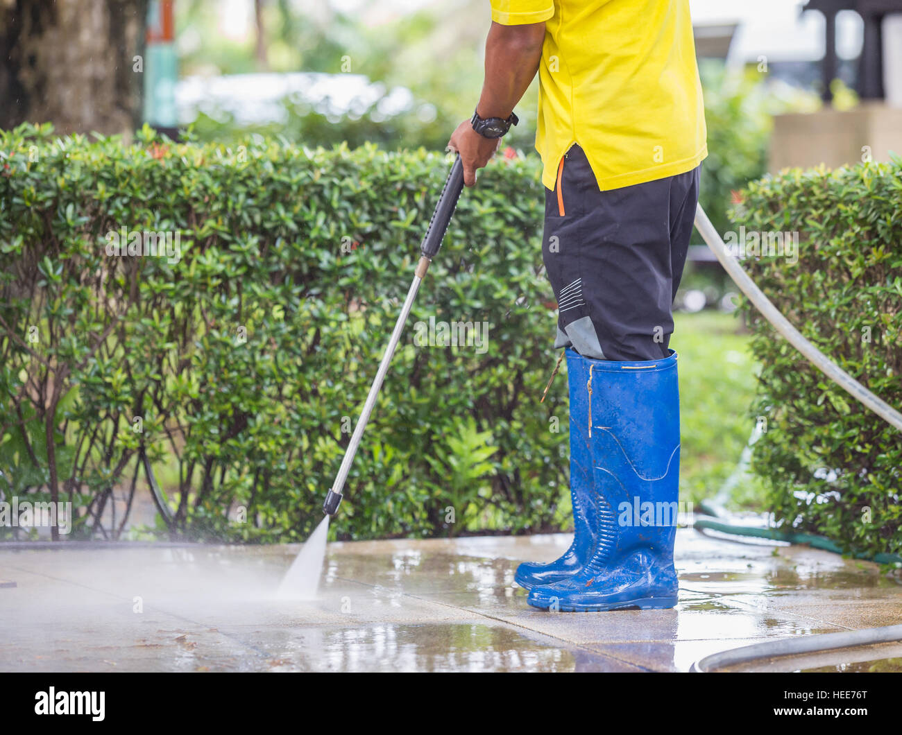 Outdoor floor cleaning with high pressure water jet Stock Photo - Alamy