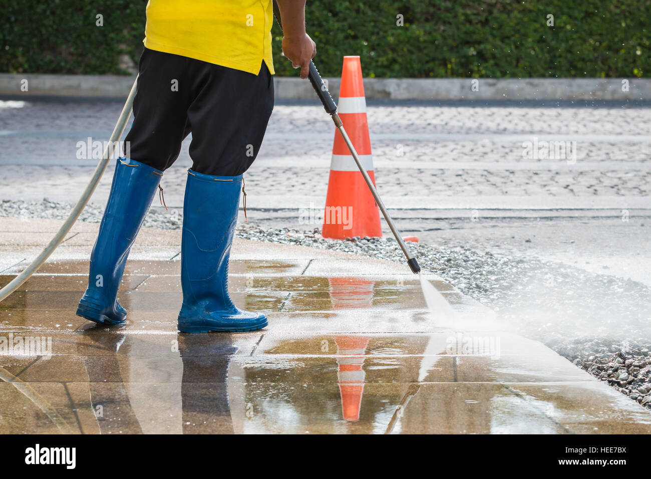 Outdoor floor cleaning with high pressure water jet Stock Photo - Alamy