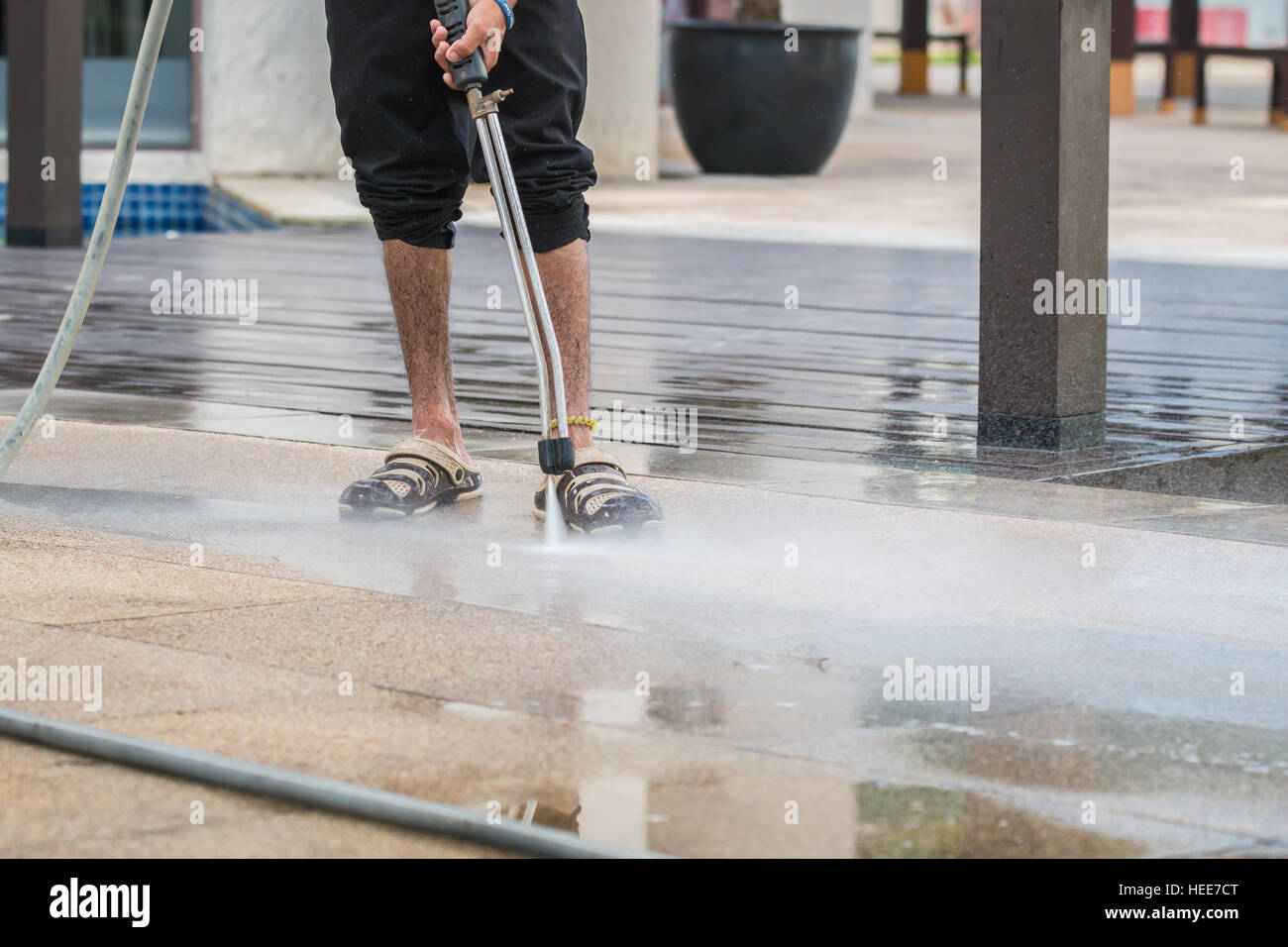 Outdoor floor cleaning with high pressure water jet Stock Photo - Alamy