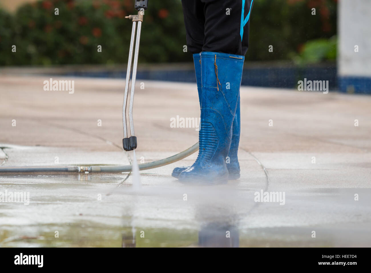 Outdoor floor cleaning with high pressure water jet Stock Photo - Alamy