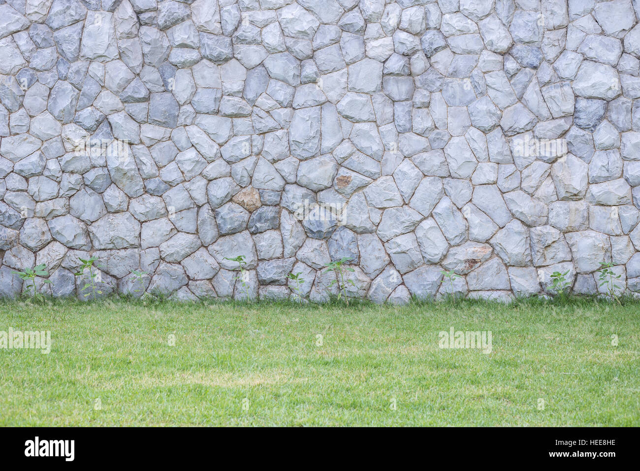 Exterior natural stone wall decorative in the garden Stock Photo - Alamy