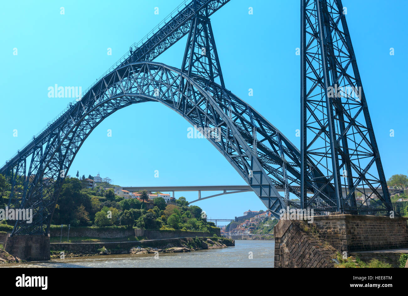 The Maria Pia railway bridge (Ponte Maria Pia) above Douro river, Porto ...