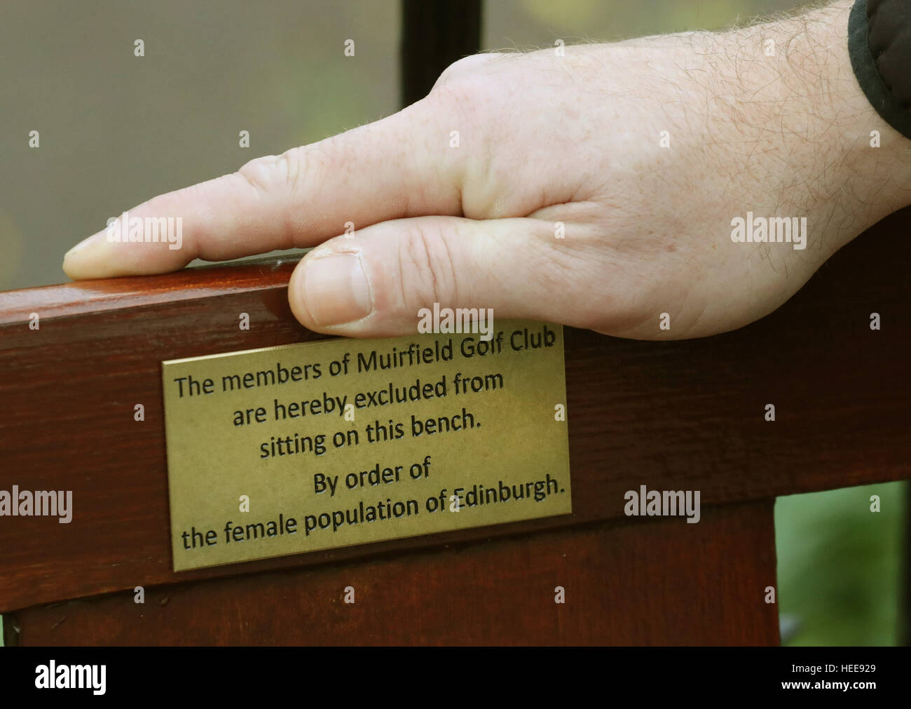 A man's hand touches a picture of a bench on Princess Street in ...