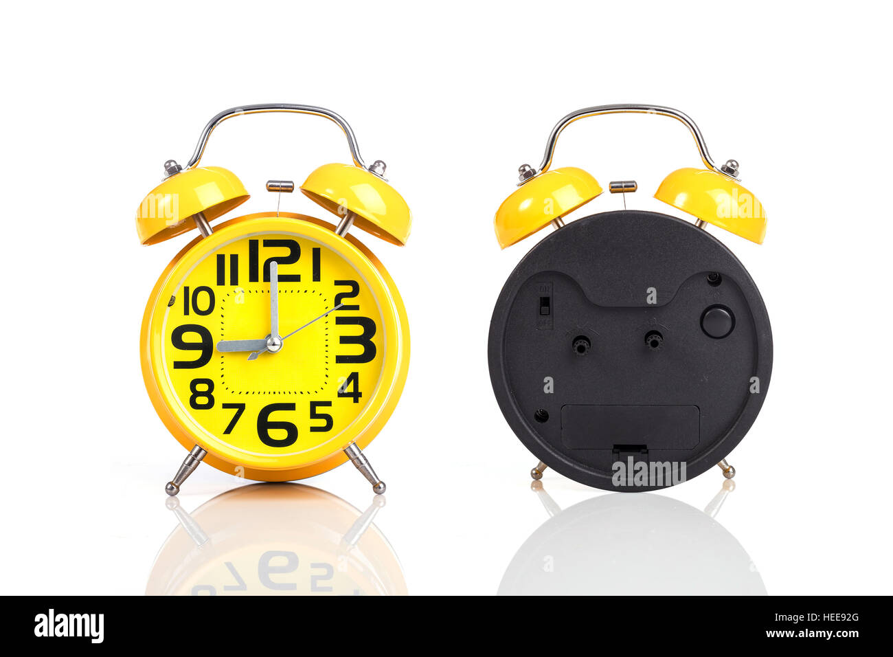 Close up yellow alarm clock isolated on white background Stock Photo ...