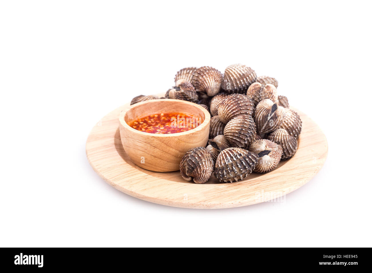 Close up boiled blood cockle with sauce isolated on white background ...