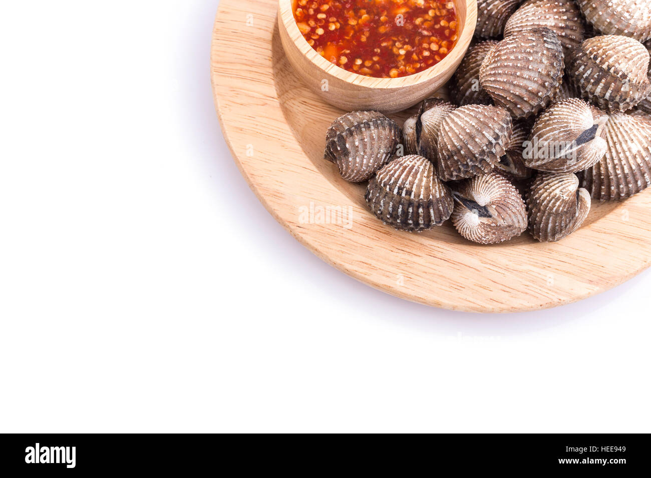 Close up boiled blood cockle with sauce isolated on white background ...