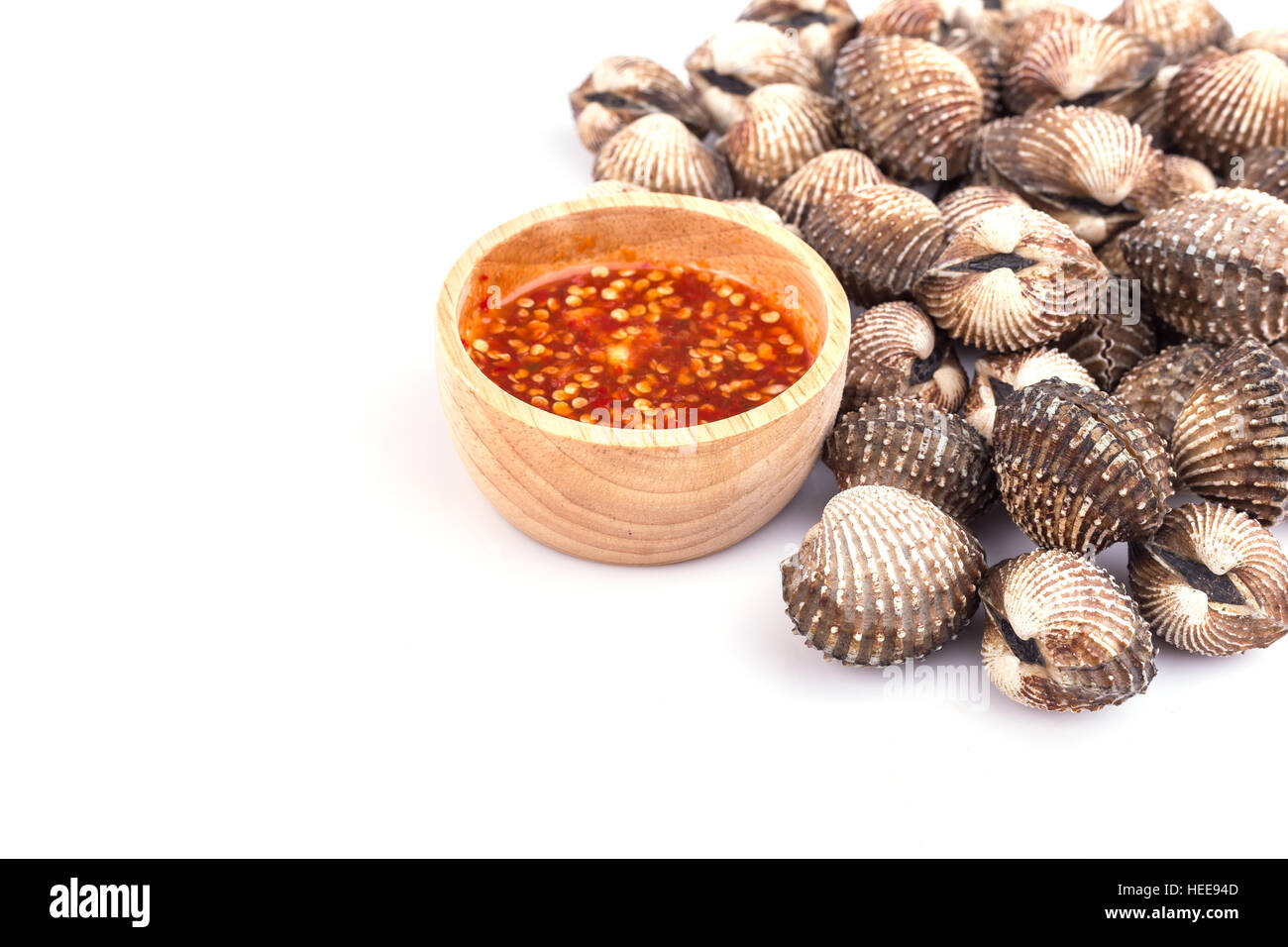 Close up boiled blood cockle with sauce isolated on white background ...