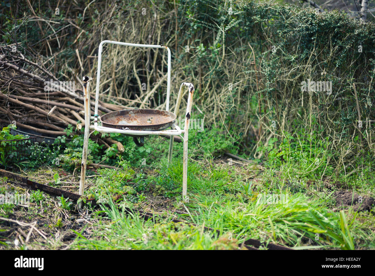 Broken garden chair hi-res stock photography and images - Alamy