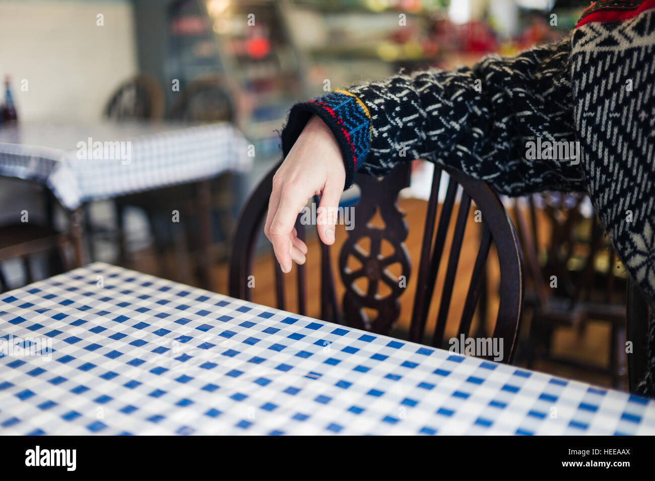 Woman sitting chair fingers hi-res stock photography and images - Alamy