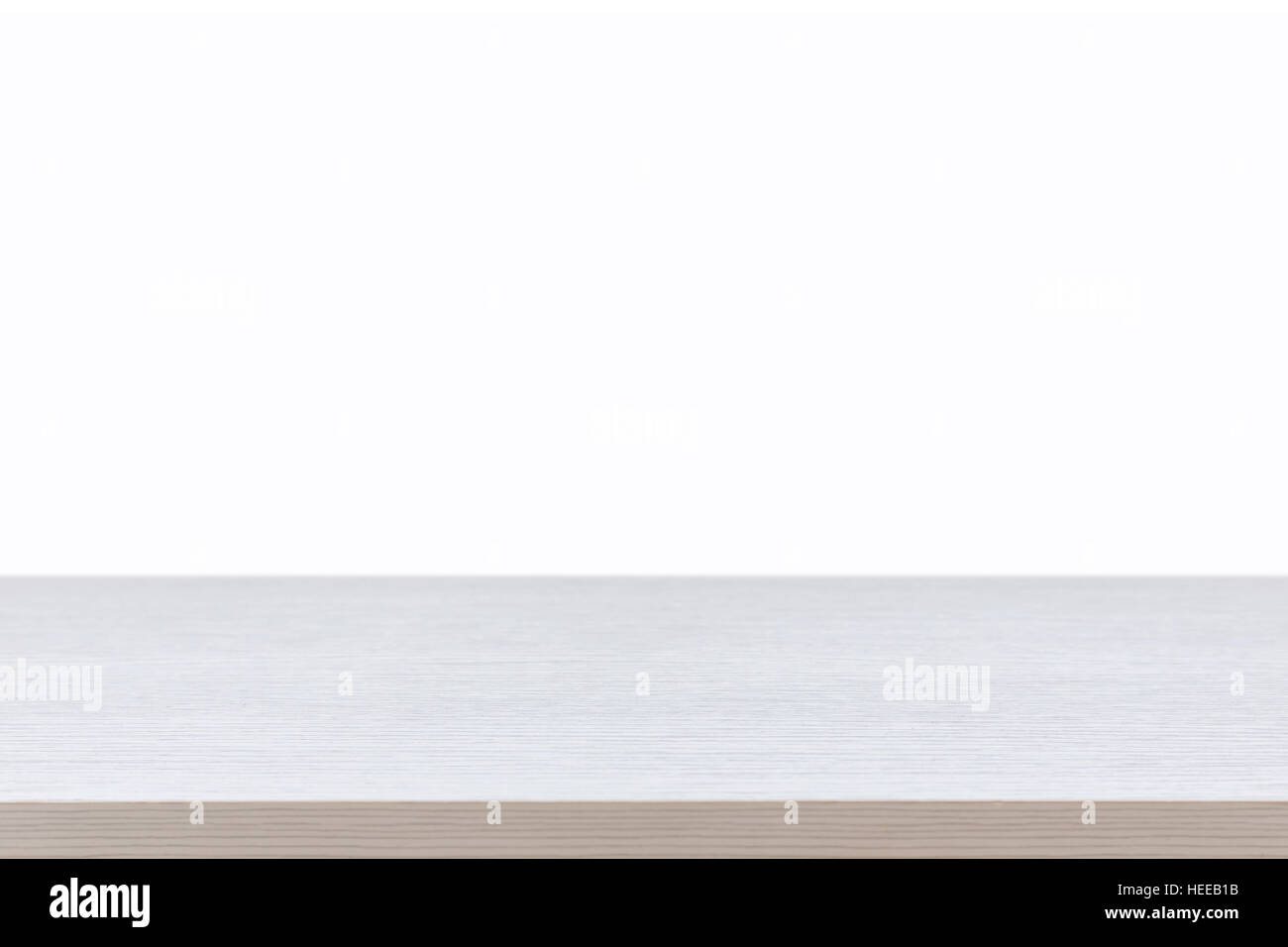 Empty top of wooden table or counter isolated on white background. For ...