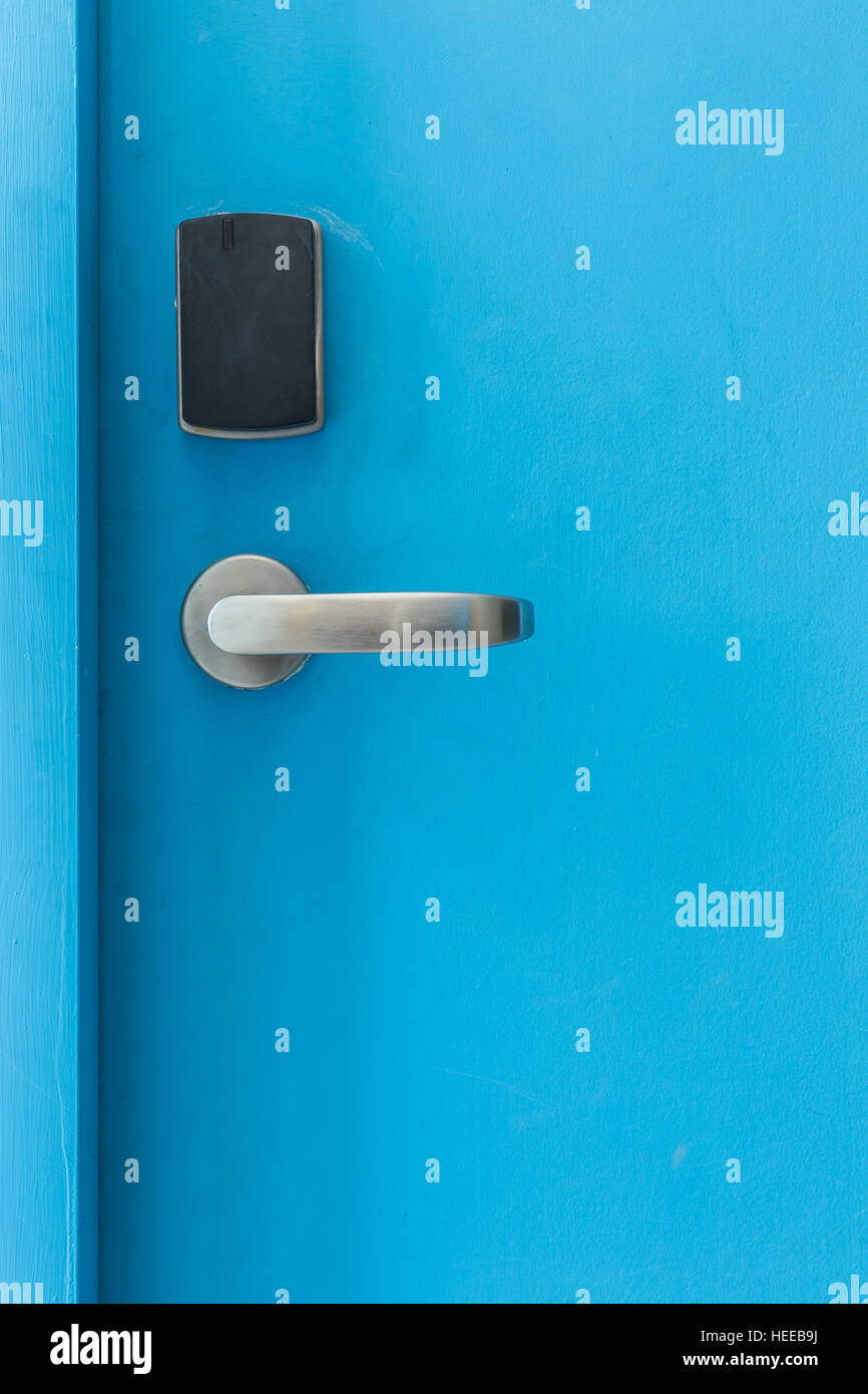 Blue entrance door with electronic keycard lock system Stock Photo - Alamy