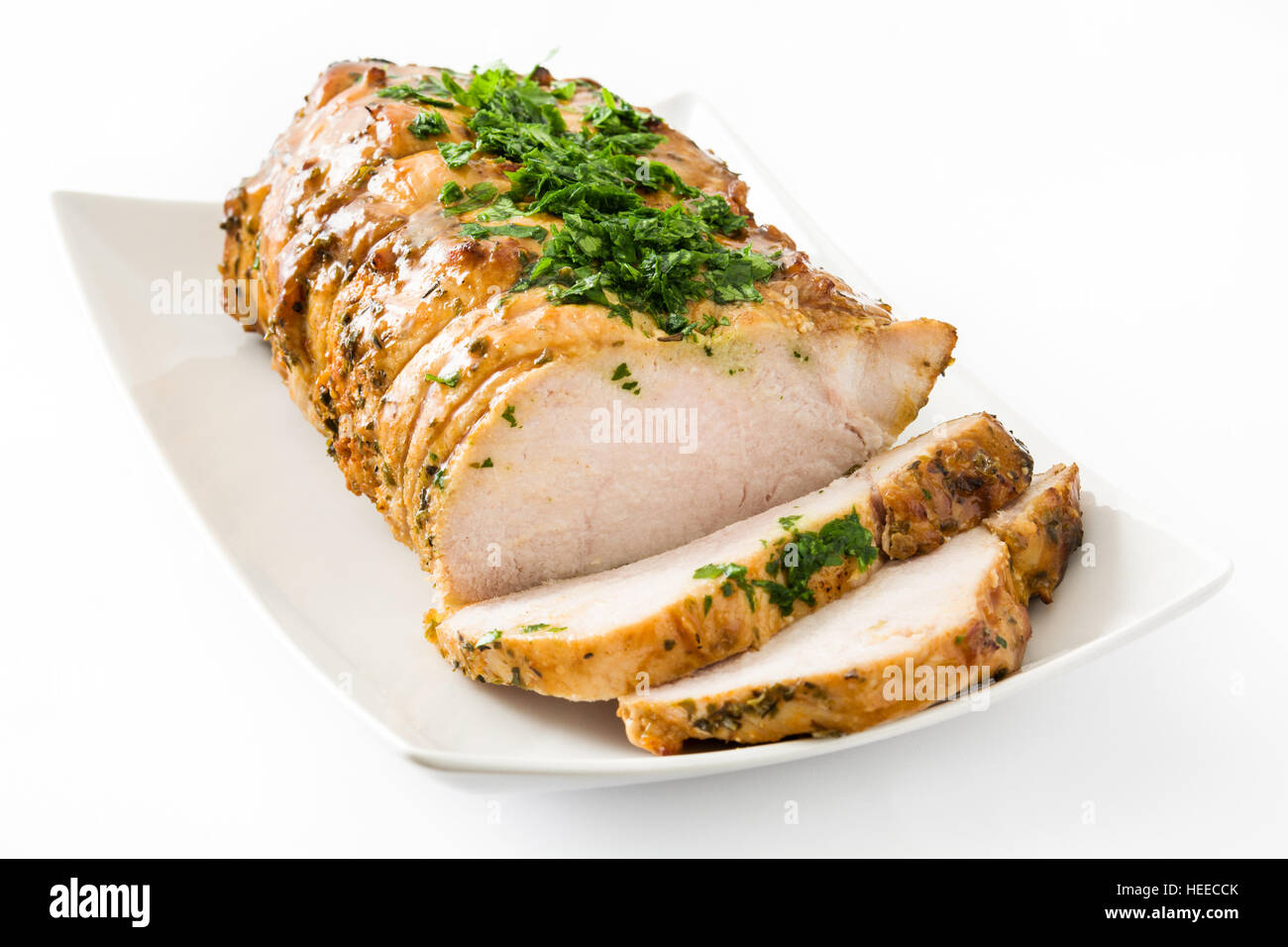 Roasted pork isolated on white background Stock Photo - Alamy