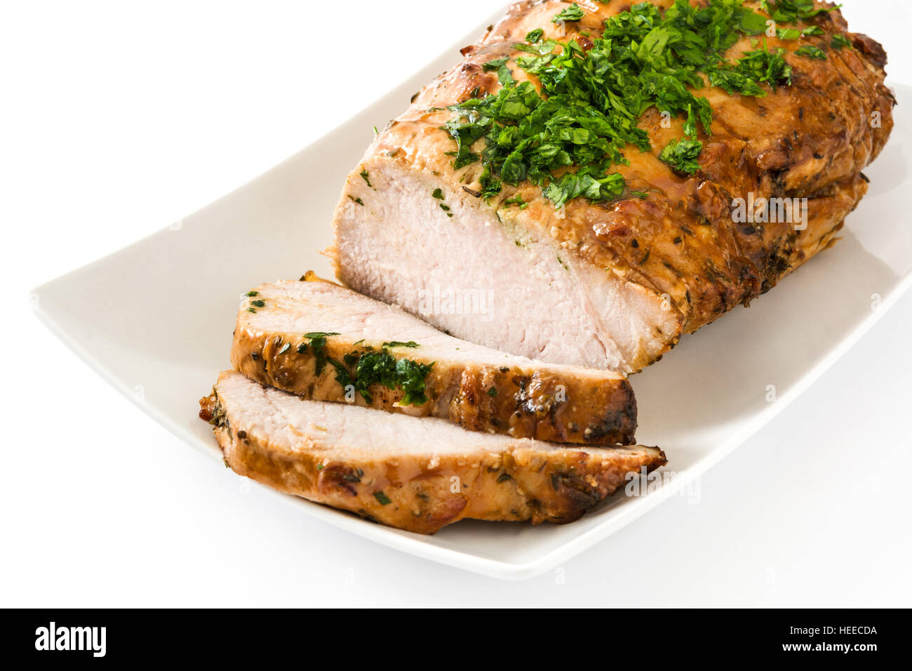 Roasted pork isolated on white background Stock Photo - Alamy
