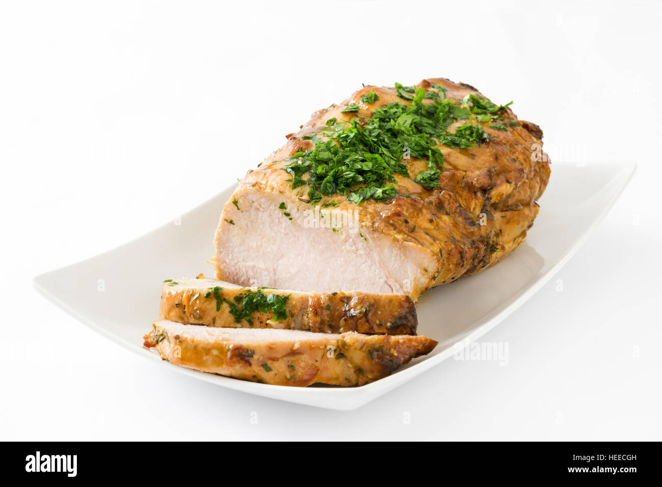 Roasted pork isolated on white background Stock Photo - Alamy