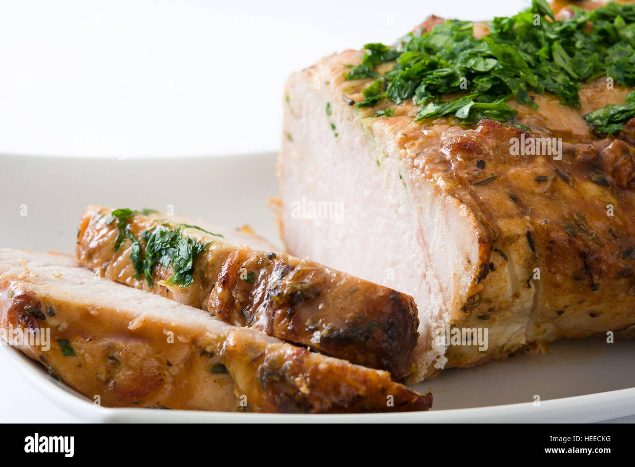 Roasted pork isolated on white background Stock Photo - Alamy