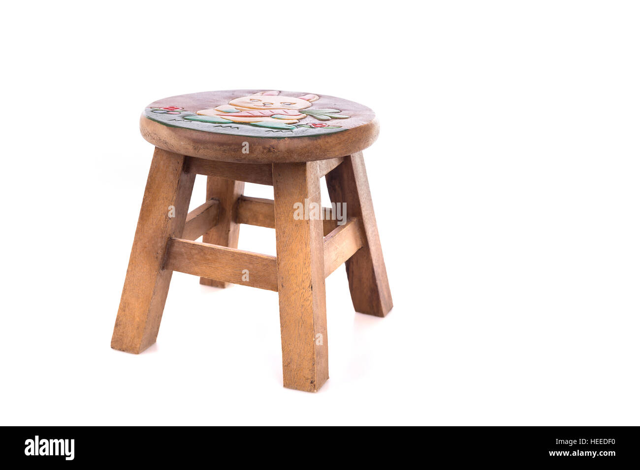 Traditional mini four legs wooden chair isolated on white background ...