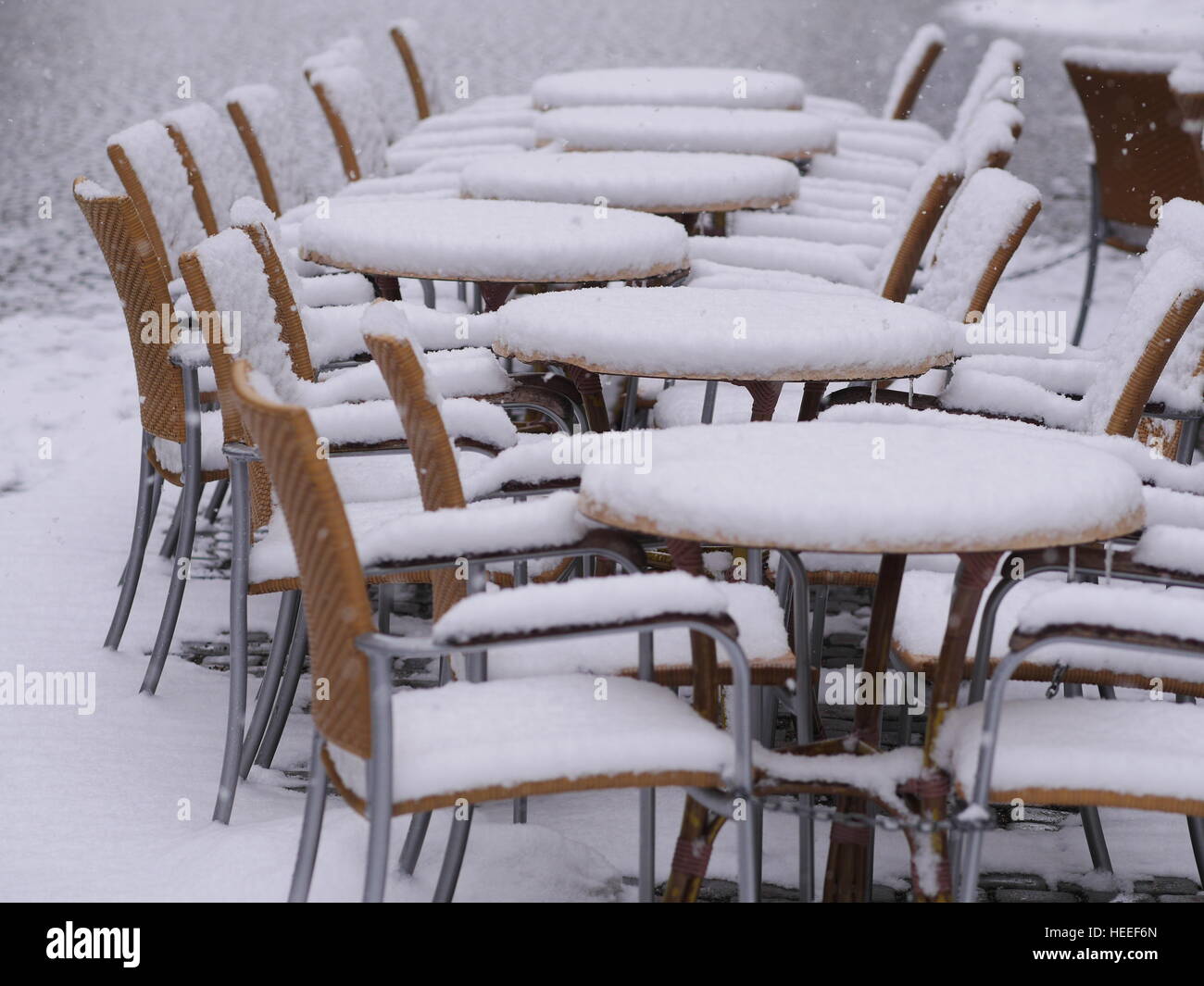 snowy chairs tables winter Stock Photo - Alamy