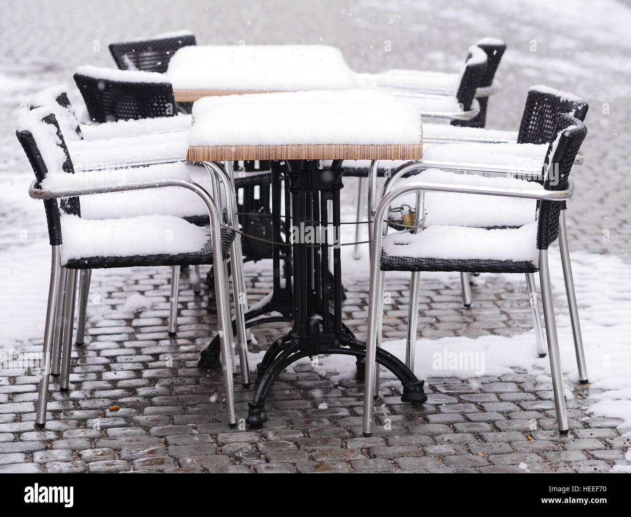 snowy chairs tables winter Stock Photo - Alamy