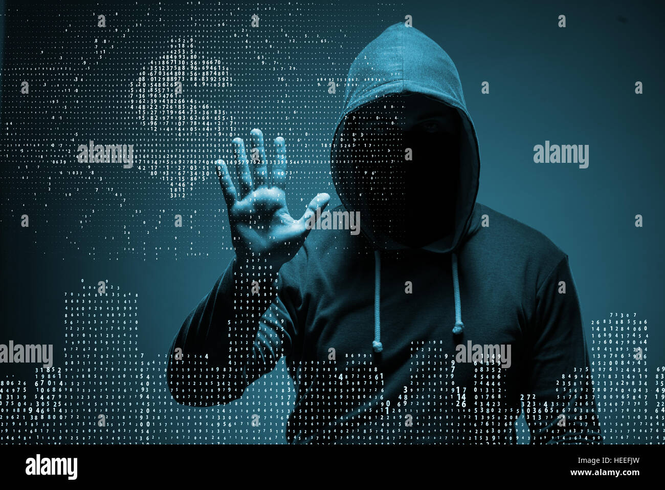 Hacker stealing dollars from bank Stock Photo - Alamy
