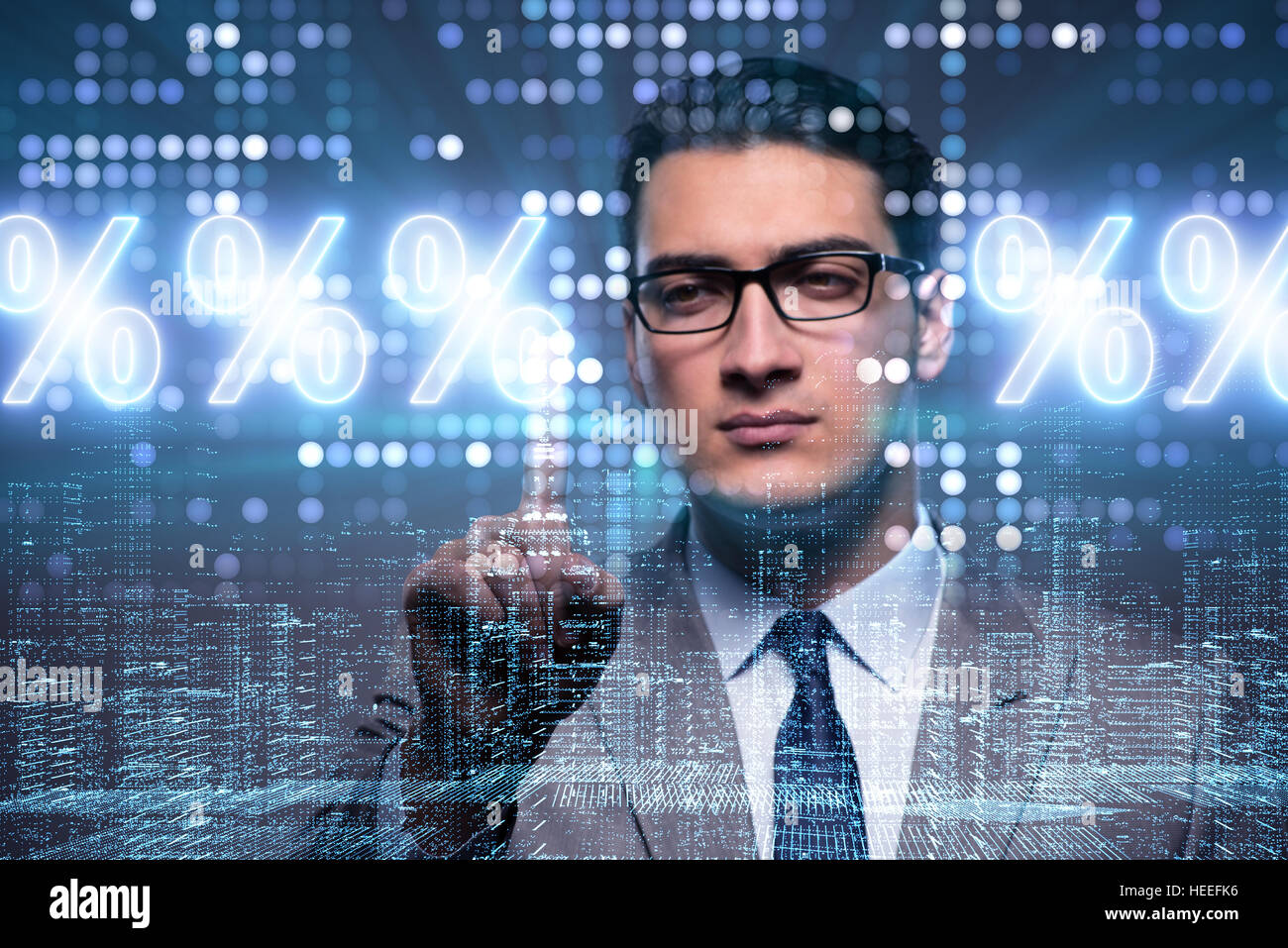 Businessman in high interest rate concept Stock Photo - Alamy