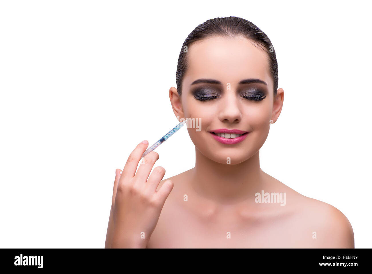 Woman undergoing plastic surgery isolated on white Stock Photo - Alamy