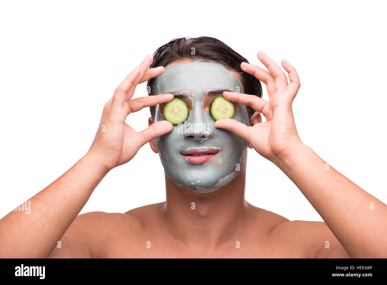 Man with mud mask isolated on white Stock Photo - Alamy