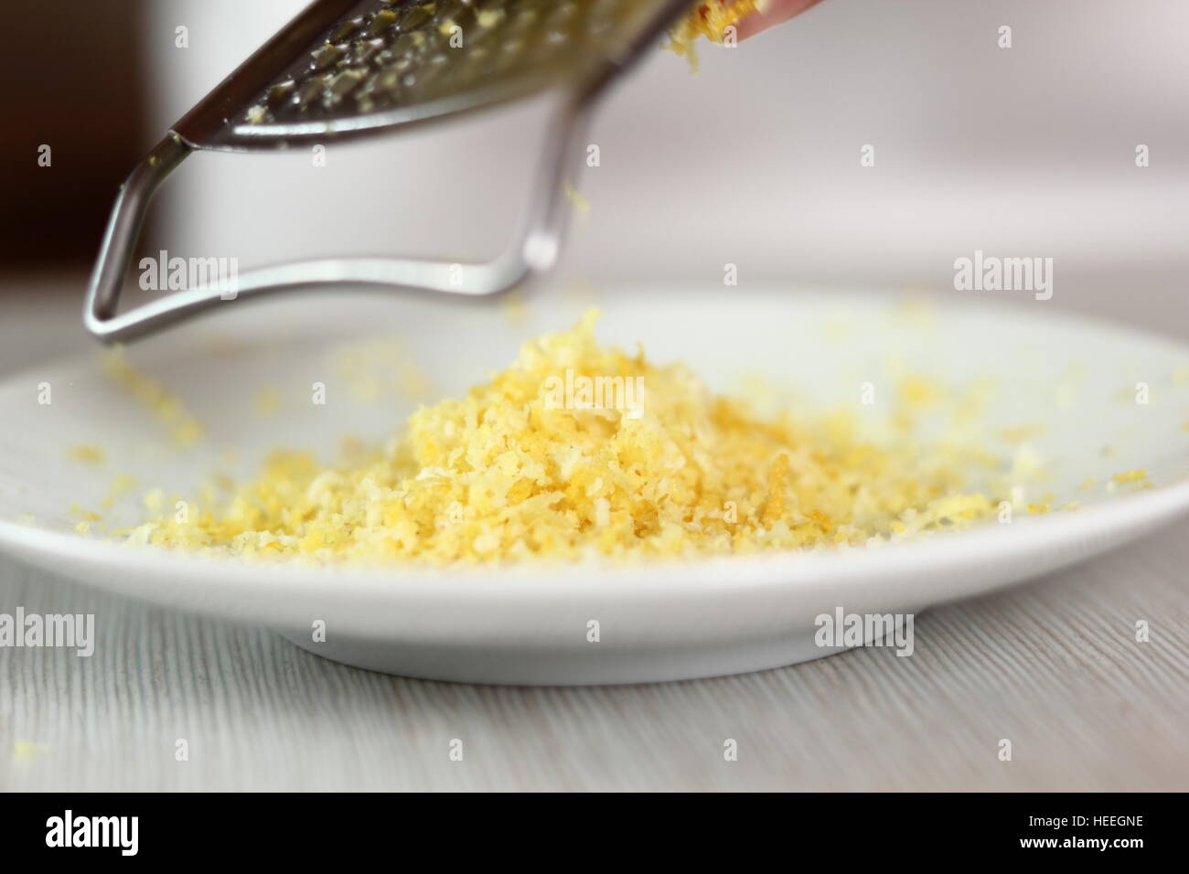 Grating lemon rind. Making Filo Pastry Topped Apple Pie Series Stock ...
