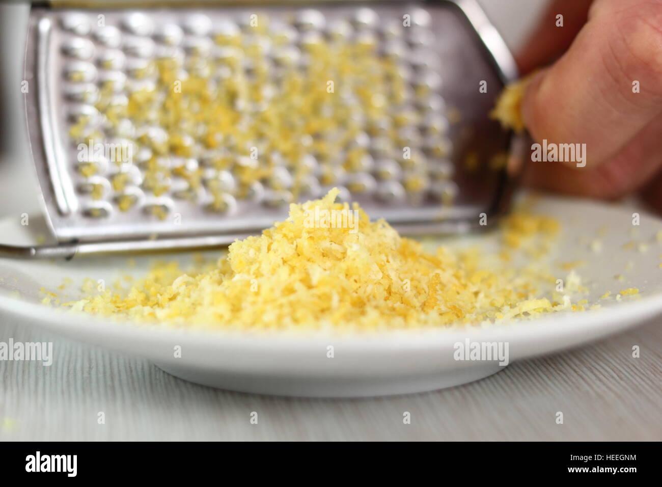 Grating lemon rind. Making Filo Pastry Topped Apple Pie Series Stock ...