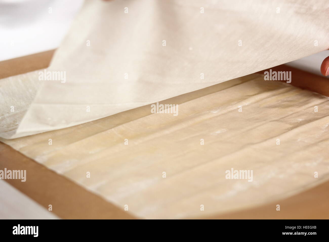 Stacking filo pastry sheet. Making Filo Pastry Topped Apple Pie Series ...