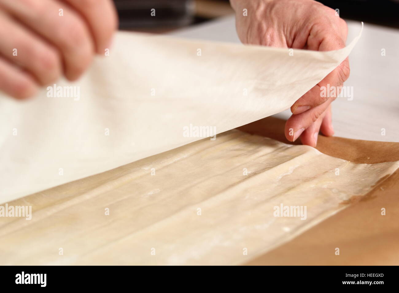 Stacking filo pastry sheet. Making Filo Pastry Topped Apple Pie Series ...